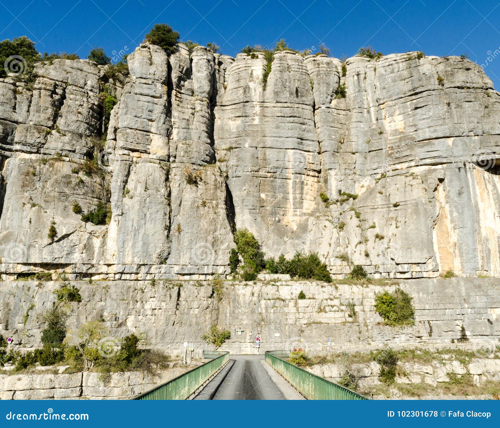 In front of cliff stock photo. Image of geological, outdoors - 102301678