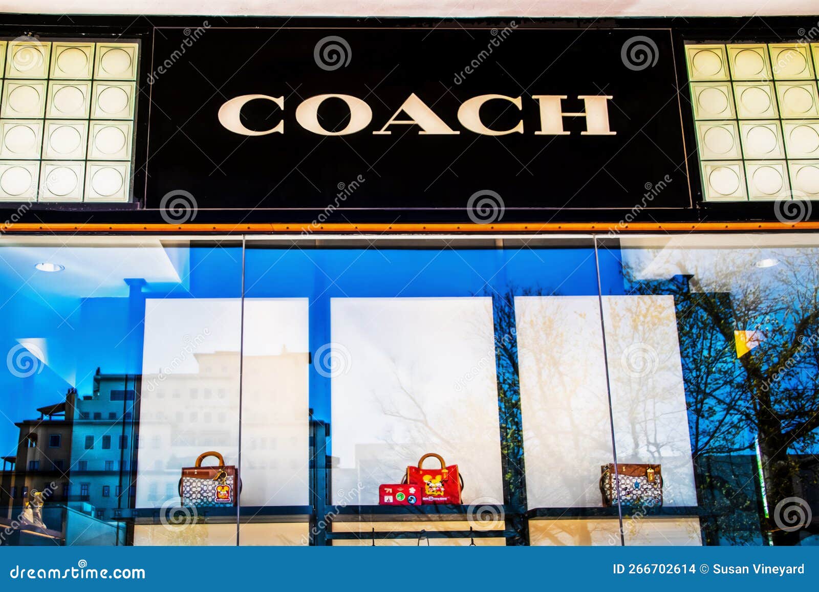 Front of Coach Store with Mickey Mouse Items Featured in Display Window ...