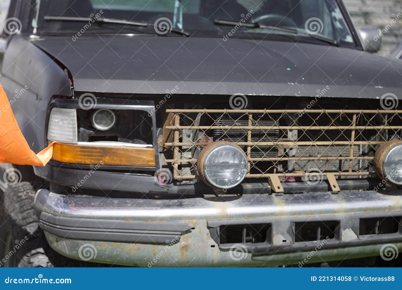 Front of damaged car stock photo. Image of headlight - 221314058