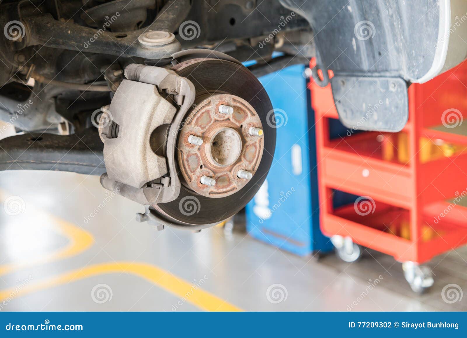 Front Disc Brake on Car in Process of New Tire Replacement Stock Photo ...