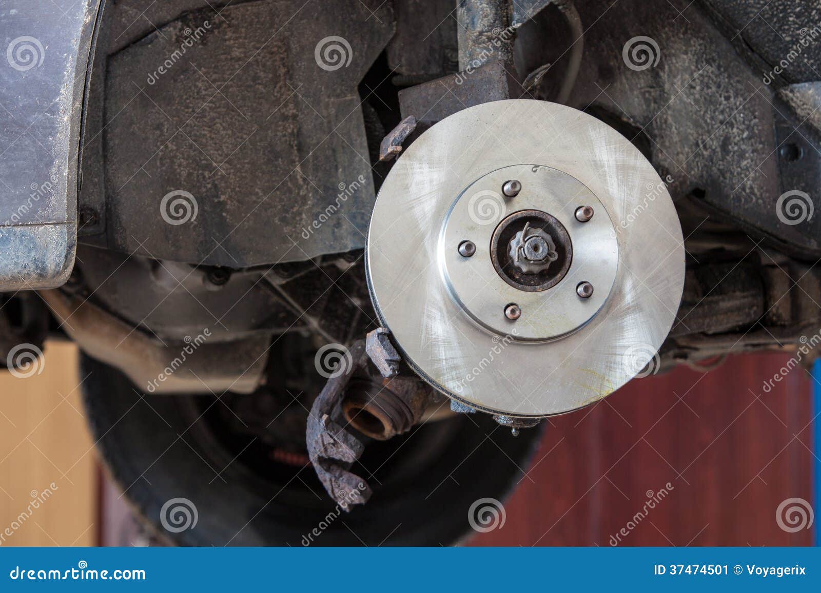 Front Disk Brake on Car in Process of Damaged Tyre Replacement. Stock ...