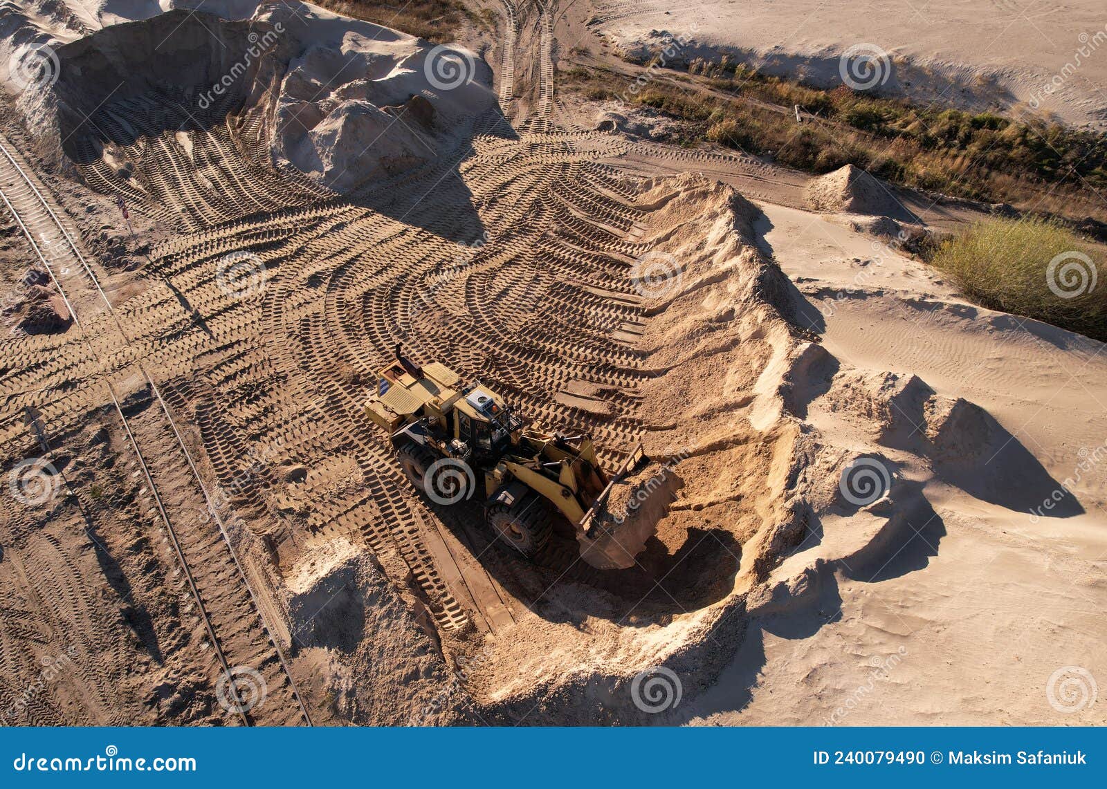 Front-end Loader during Digging and Excavation Operations in Open Pit ...