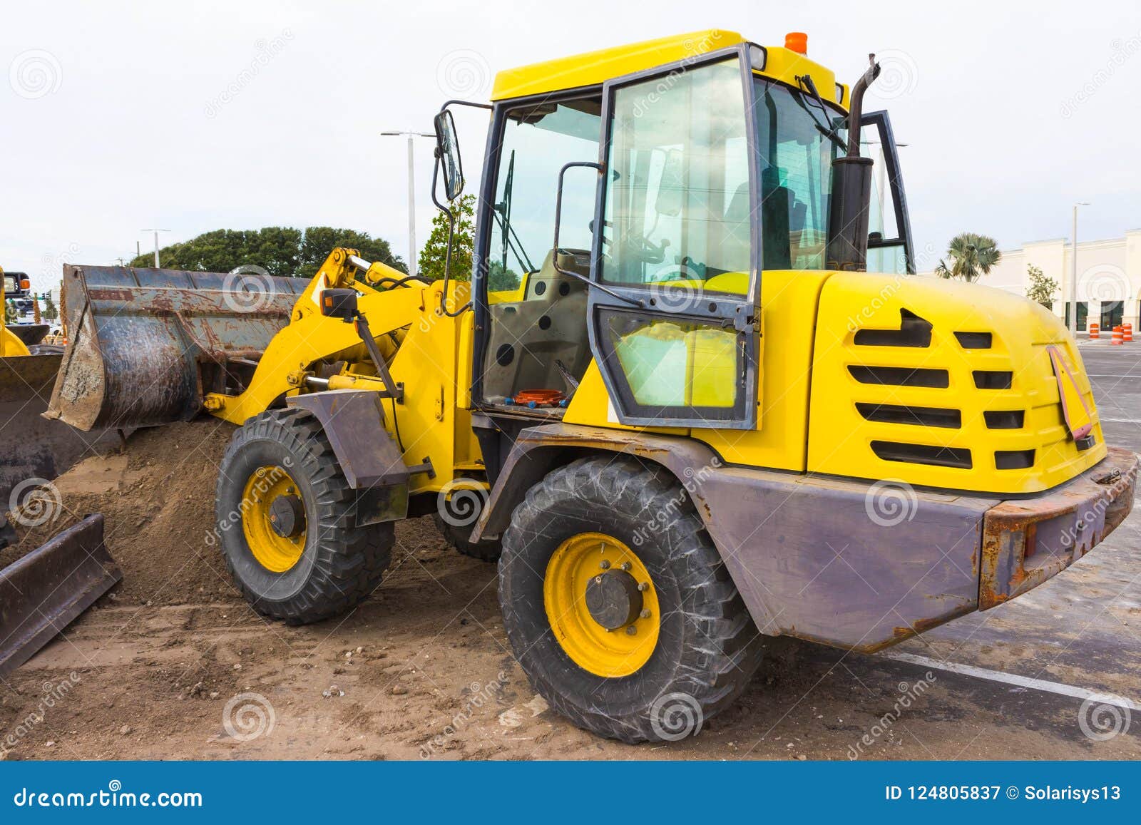Front End Loader Dumping Stone and Sand in a Mining Quarry Stock Image ...