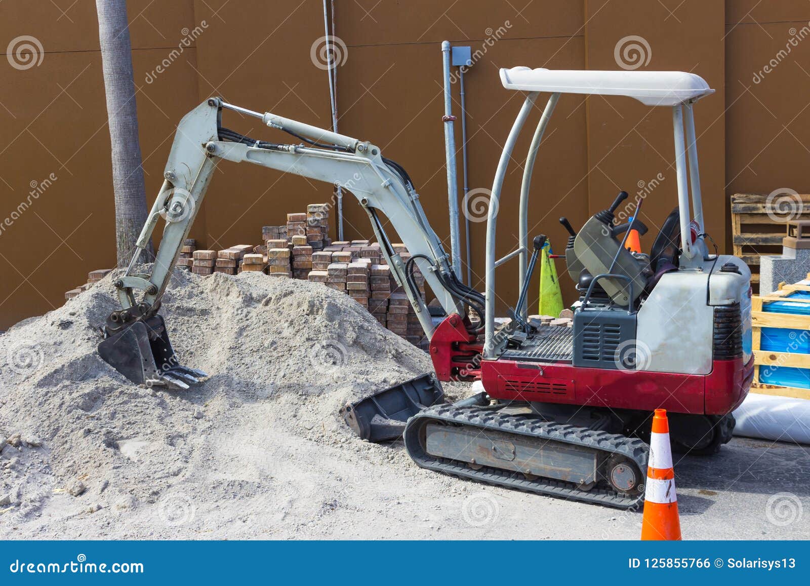 Front End Loader Dumping Stone and Sand in a Mining Quarry Stock Photo ...