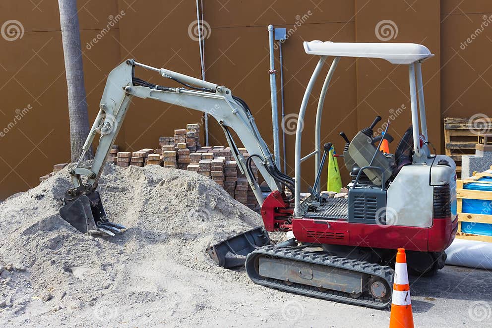 Front End Loader Dumping Stone and Sand in a Mining Quarry Stock Photo ...