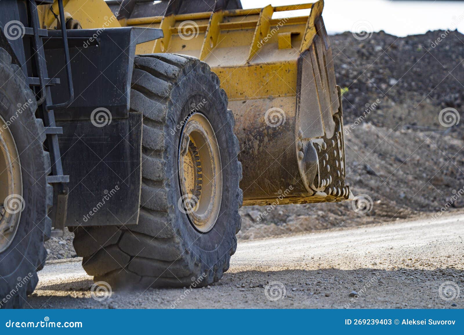 A Front End Loader Machine Tipping Sand in a Stock Image - Image of ...