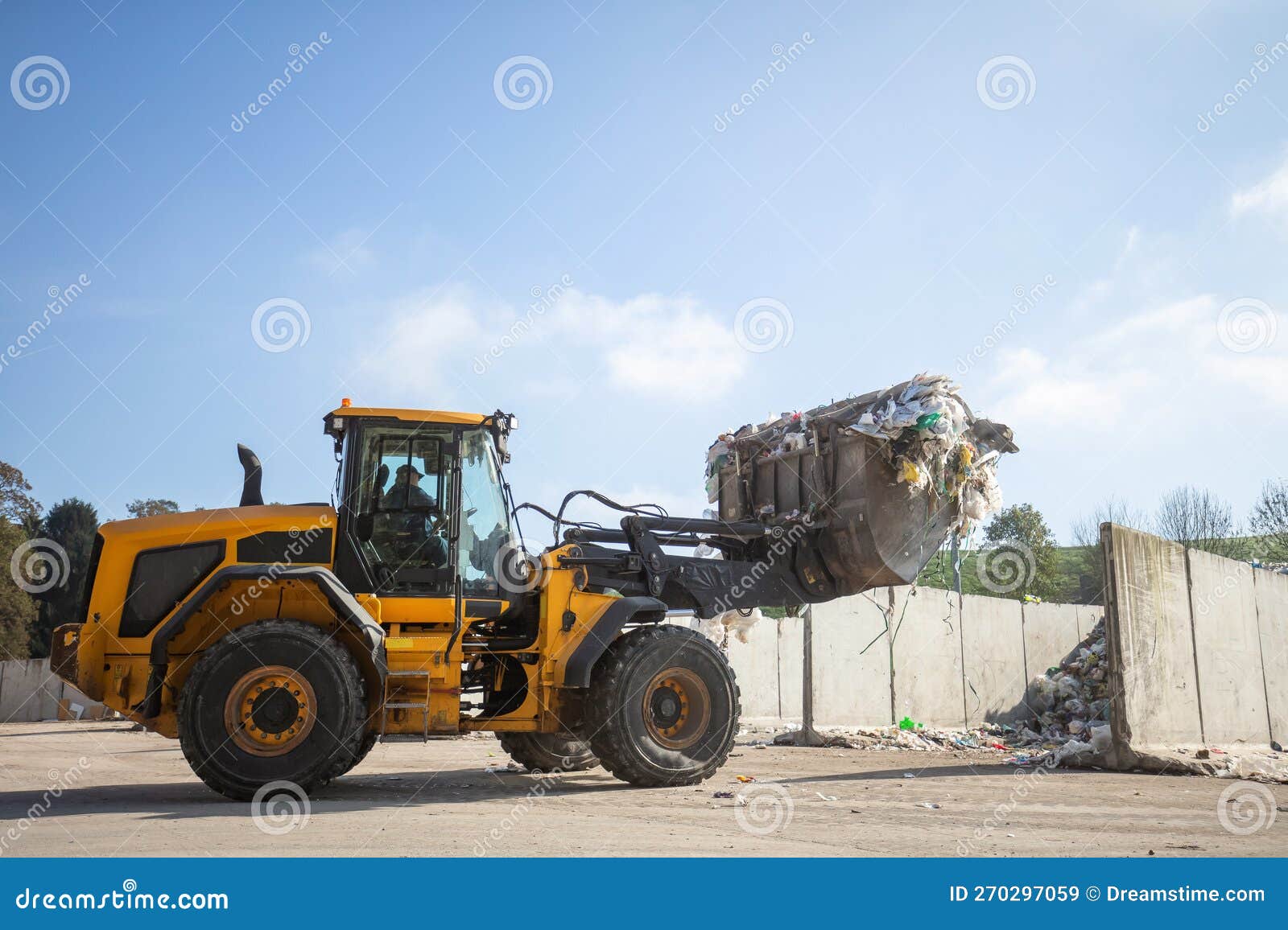 Front End Loader Moving Along Recycling Center Area, Close Up View ...