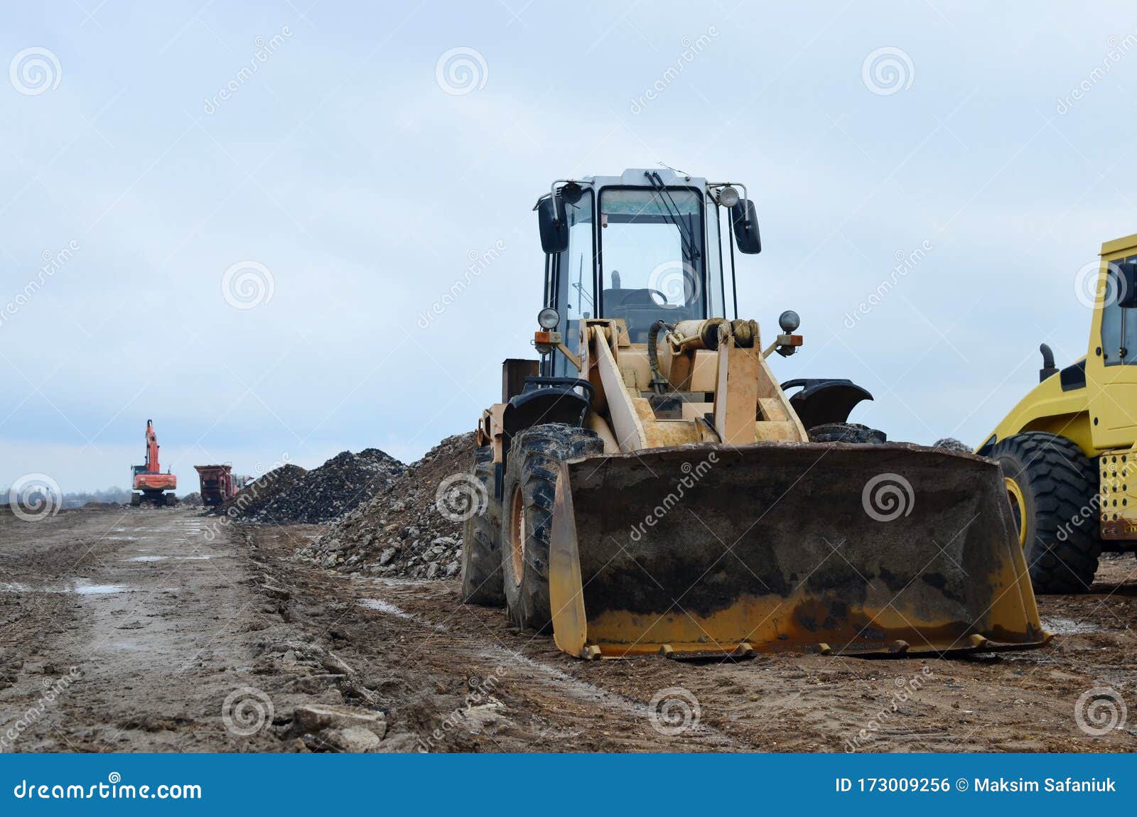 Front-end Loader Working on Construction Site during the Renovation of ...