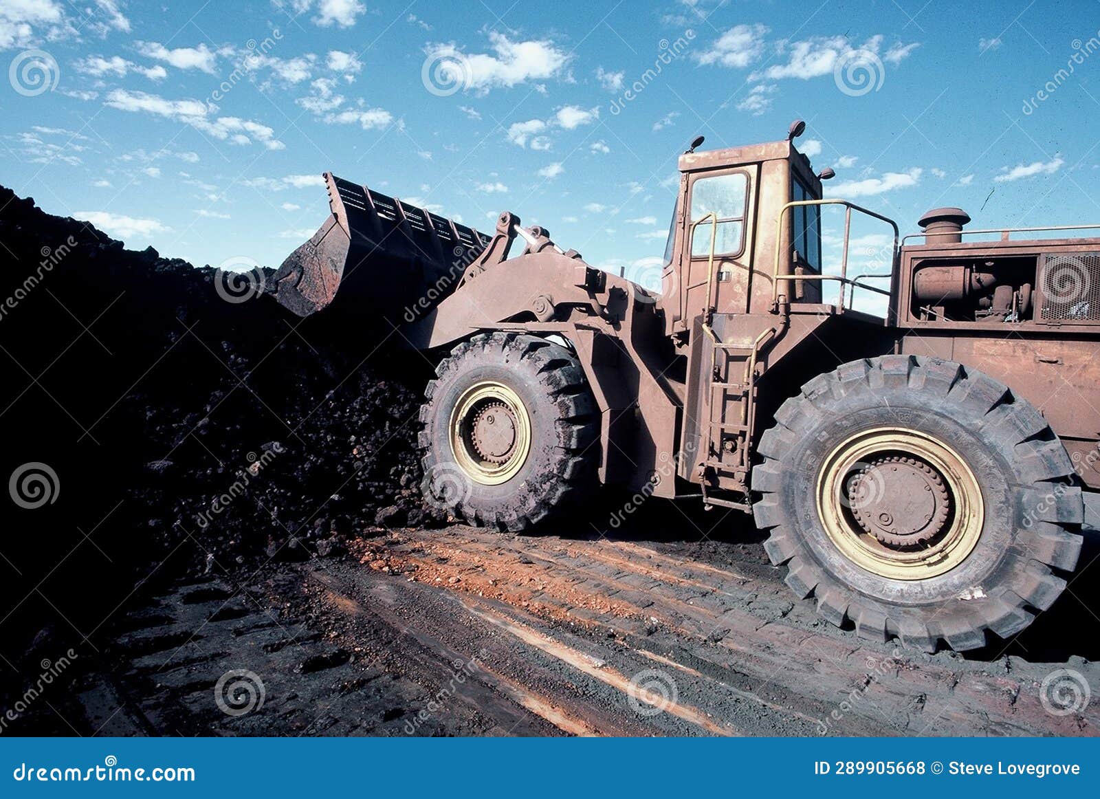 Front End Loader Working Gold Ore Stockpile Stock Photo - Image of ...