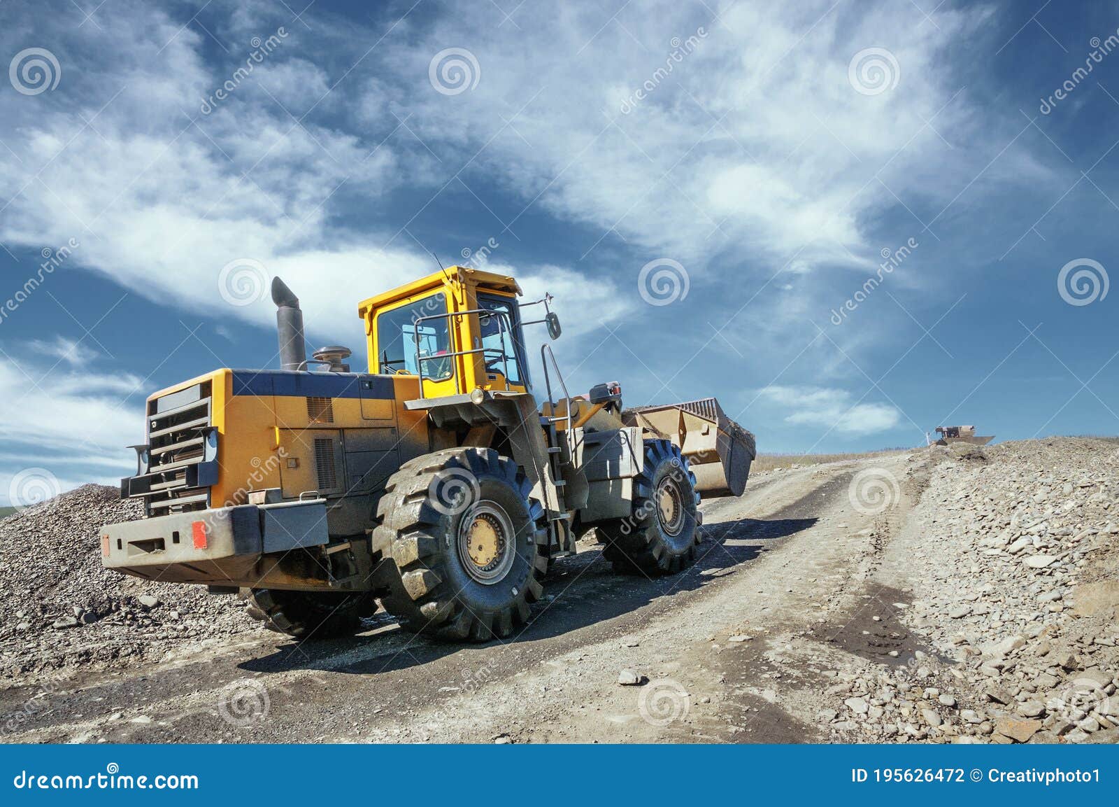 Front-end Wheel Loader in the Process Stock Photo - Image of equipment ...
