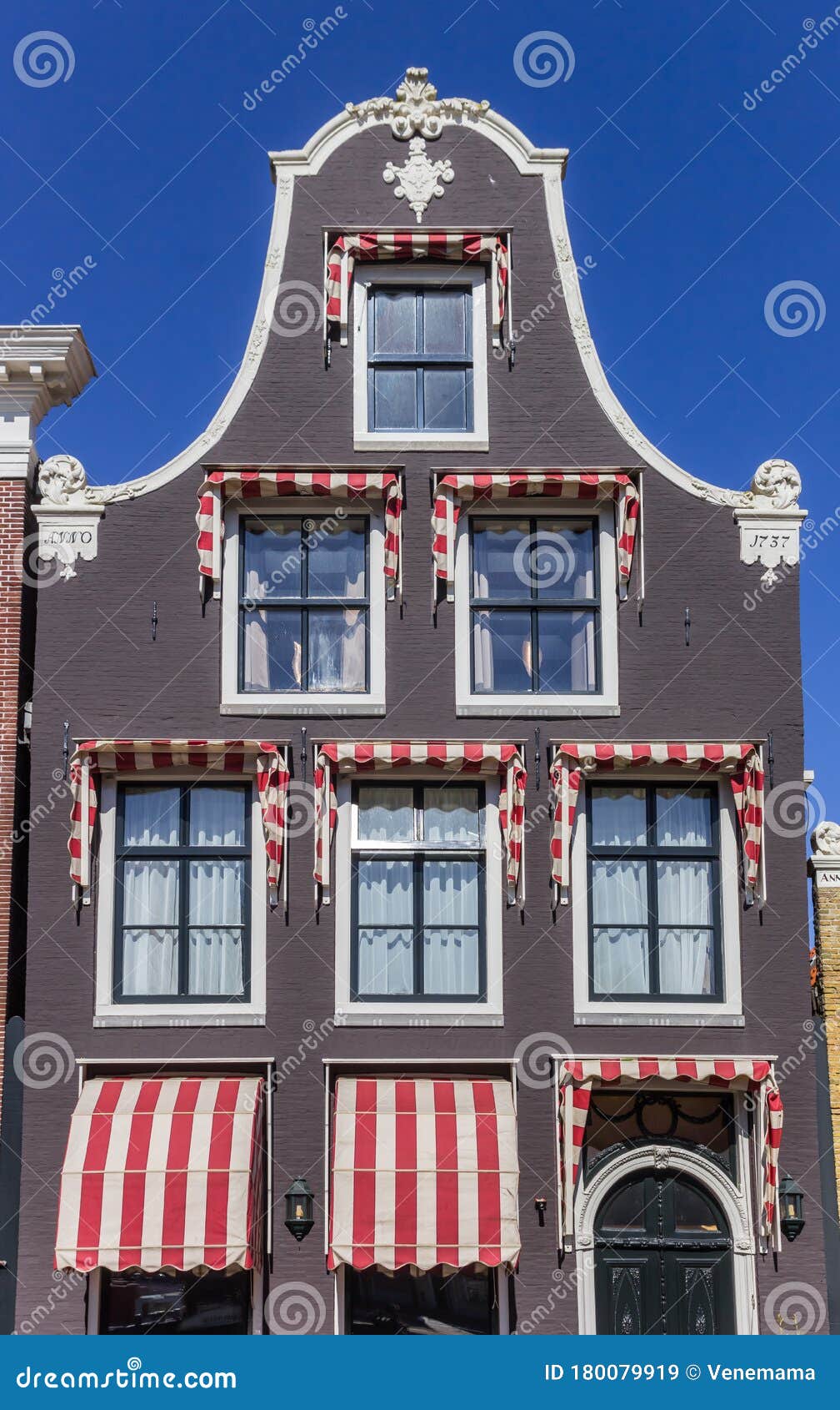 Front Facade of a Historic House with Clock Gable in Harlingen Stock ...