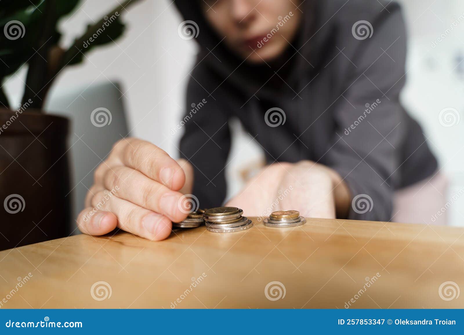 Front Focus On Coins With Blurred Woman Counting Coins With Sad Face Stock Image Image Of