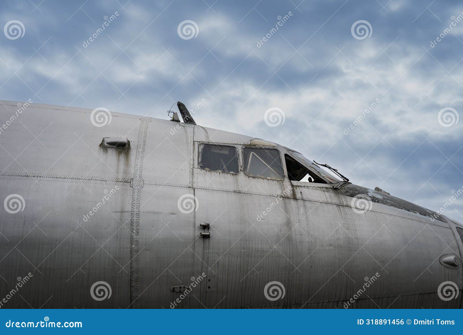 The Front Fuselage of an Old an 12 Military Cargo Aircraft Stock Photo ...