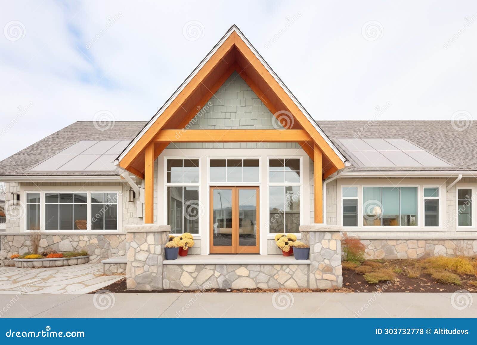 Front Gable View of Shingle House with Stone Groundwork Stock Photo ...