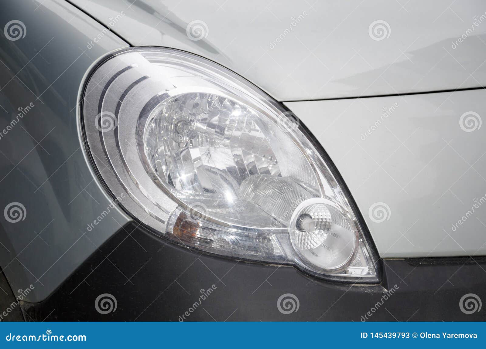 Front headlight of the car stock image. Image of detail - 145439793