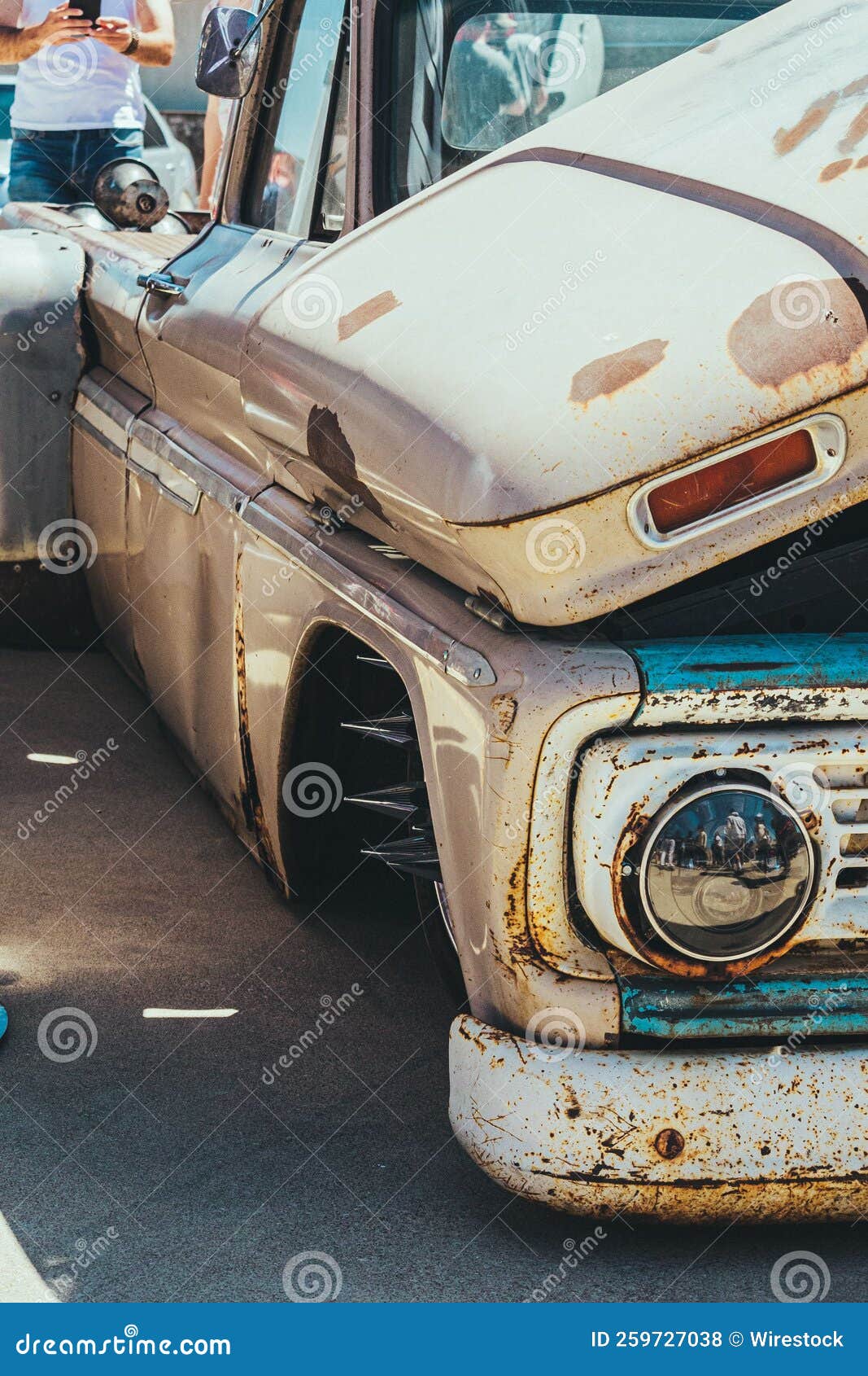Front Left View of a Brown Old Car with Spikes on Its Wheels Stock ...