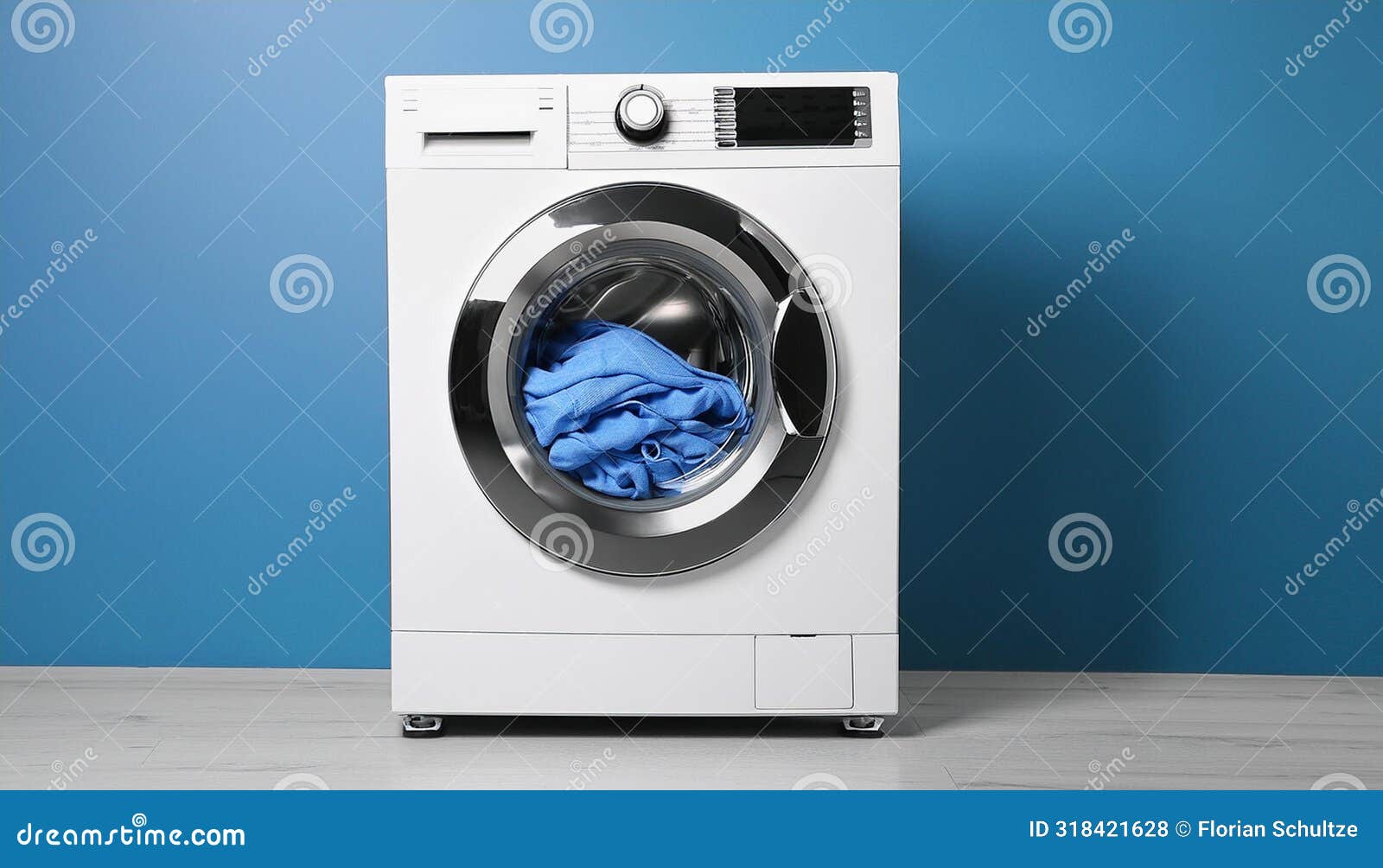 A Front-load Washing Machine with Blue Laundry, Showcasing Household ...