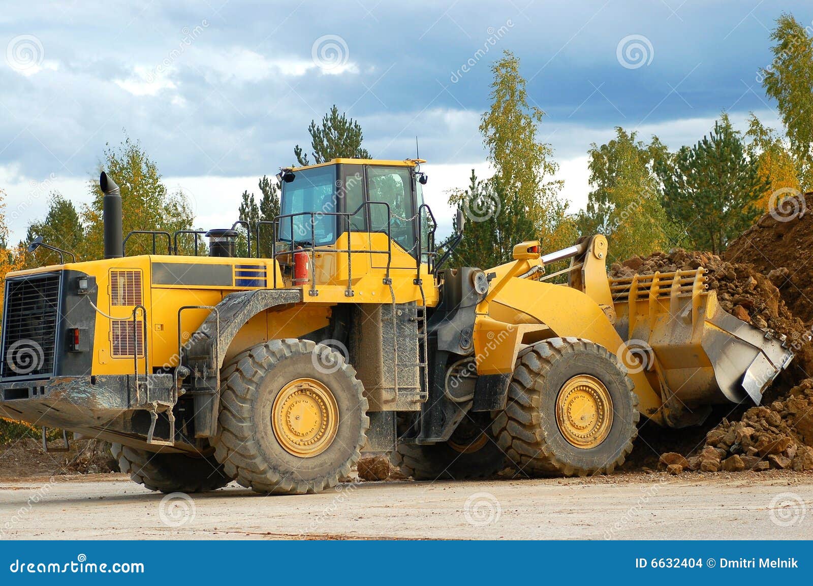 Front loader in action stock photo. Image of energy, loading - 6632404