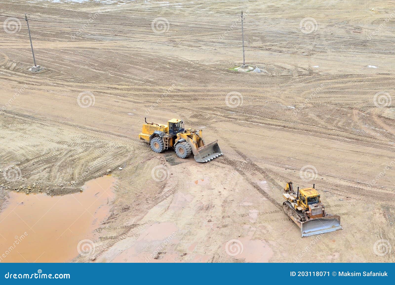 Front Loader and Bulldozer Working in an Open Pit. Mining Industry ...