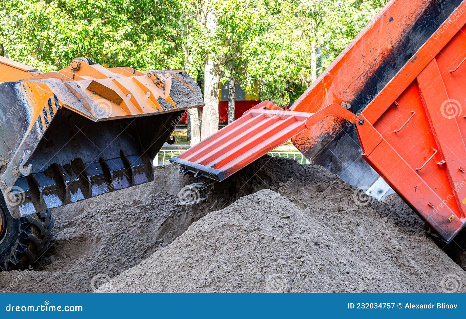 Front Loader and Dump Truck Unload Sand Stock Image - Image of ...