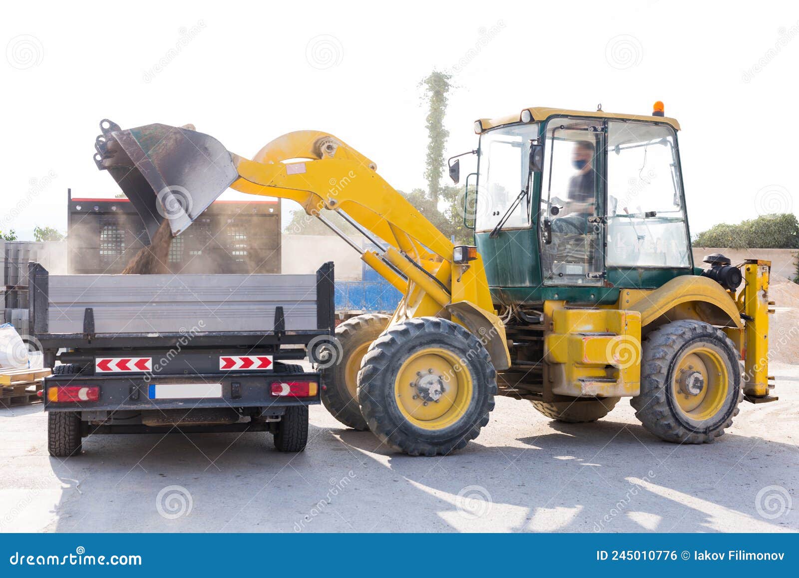 Front Loader Loads Sand into the Back of Truck Stock Photo - Image of ...