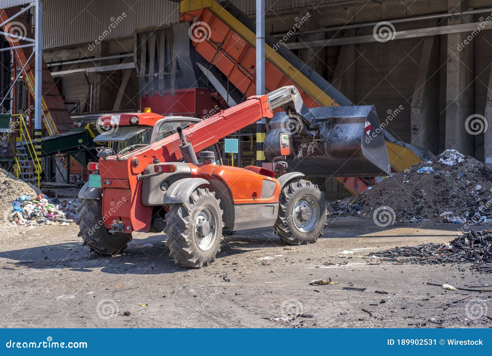 Front Loader Transporting Industrial and Communal Waste Materials in ...