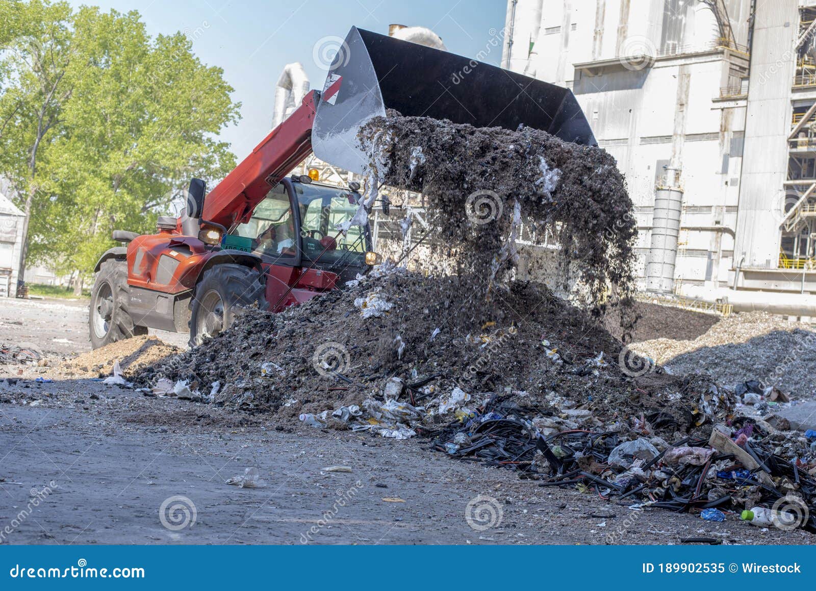 Front Loader Transporting Industrial and Communal Waste Materials in ...
