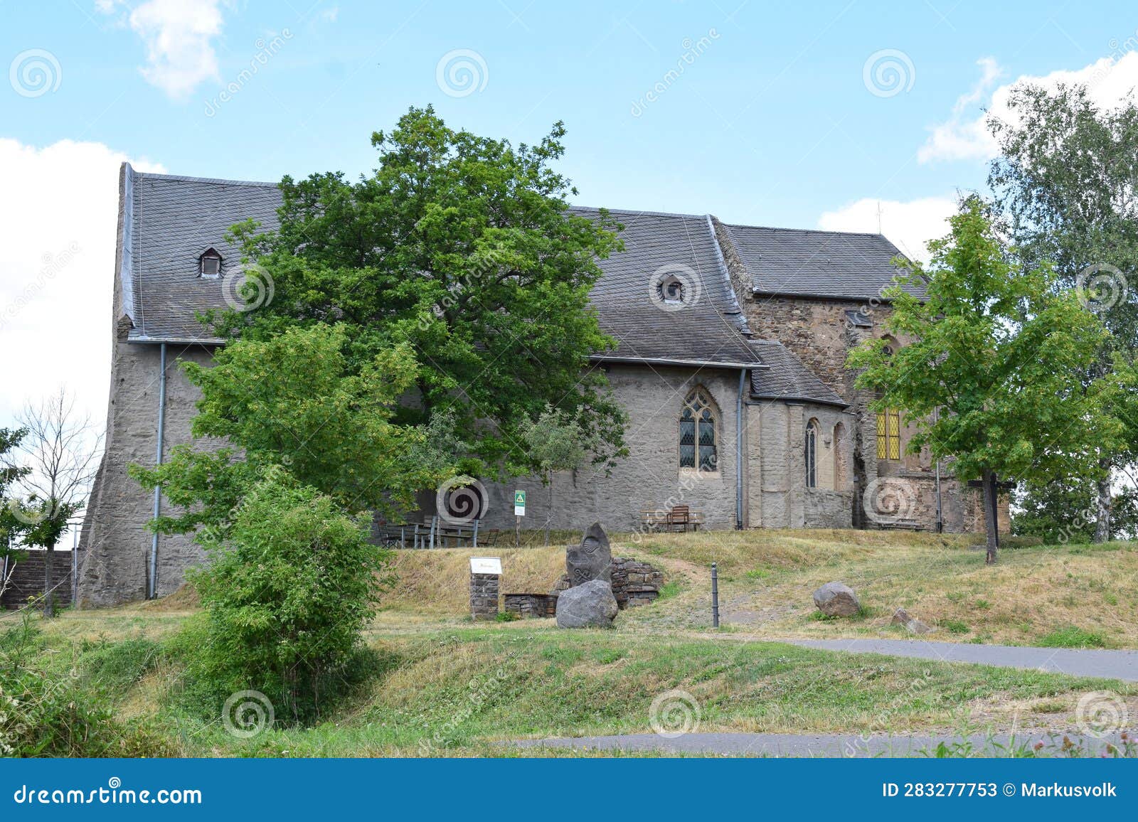 Front of a medieval church stock image. Image of frau - 283277753