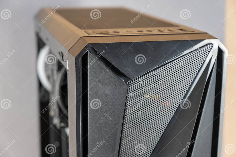 The Front of a Modern Desktop Computer. Black System Unit in a ...