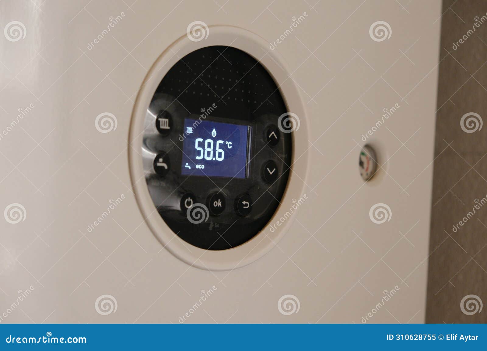 Front Panel of Gas Combi Boiler with 58,6 Celsius and Eco Sign on the ...