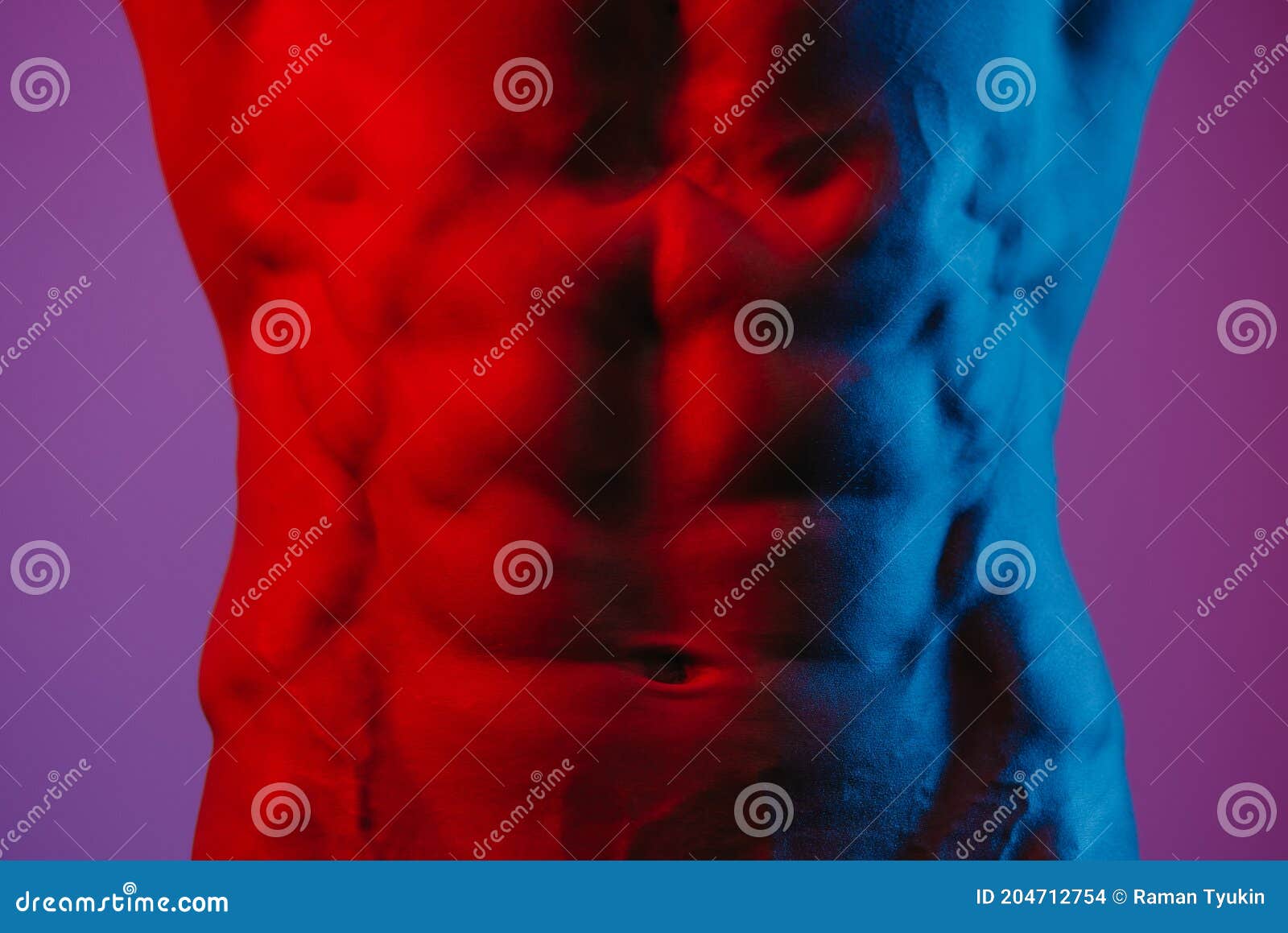 A Front Photo of the Abs of a Bodybuilder Under Blue and Red Lights ...