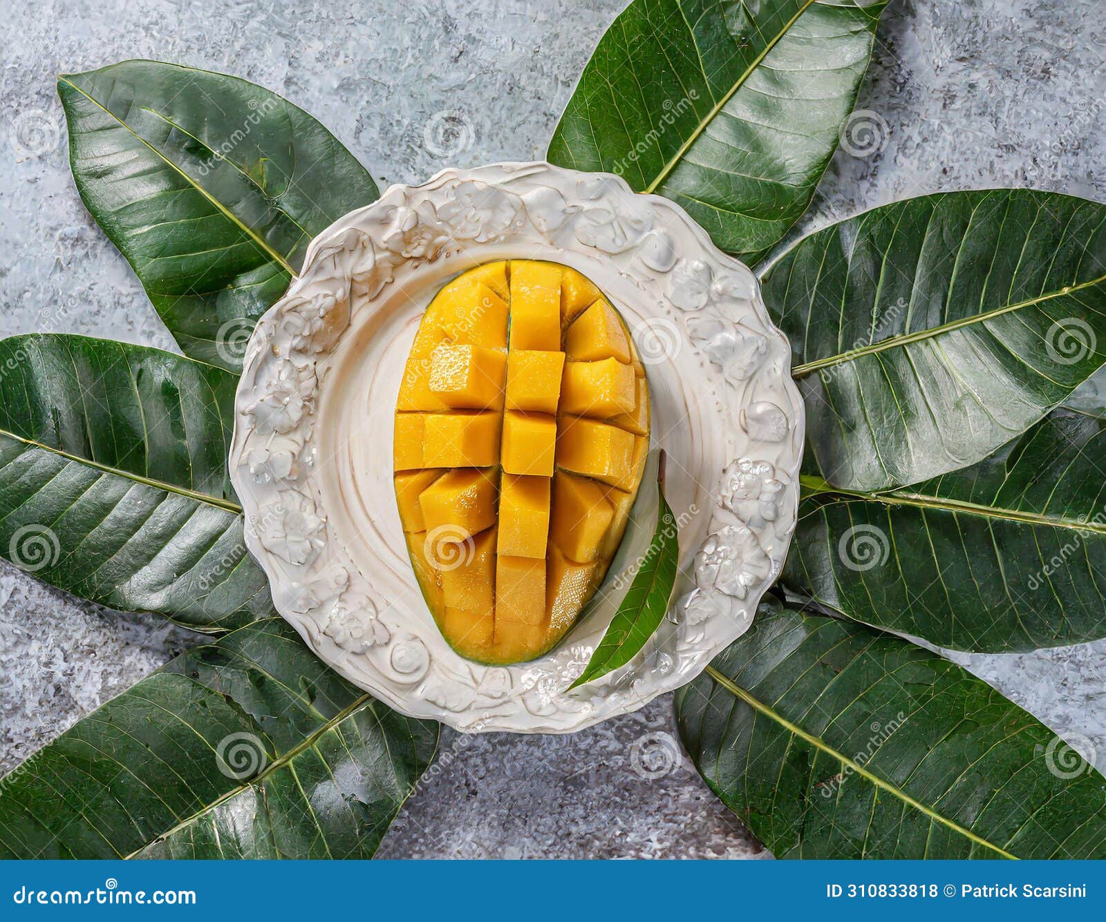 Front Shot of the Inside of the Mango Fruit on a Wooden Kitchen Table ...