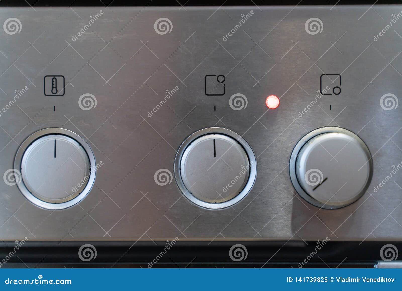 The Front Silver Control Panel of the Stove with Handles Switching ...