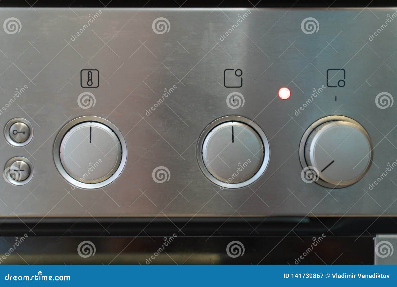 The Front Silver Control Panel of the Stove with Handles Switching ...