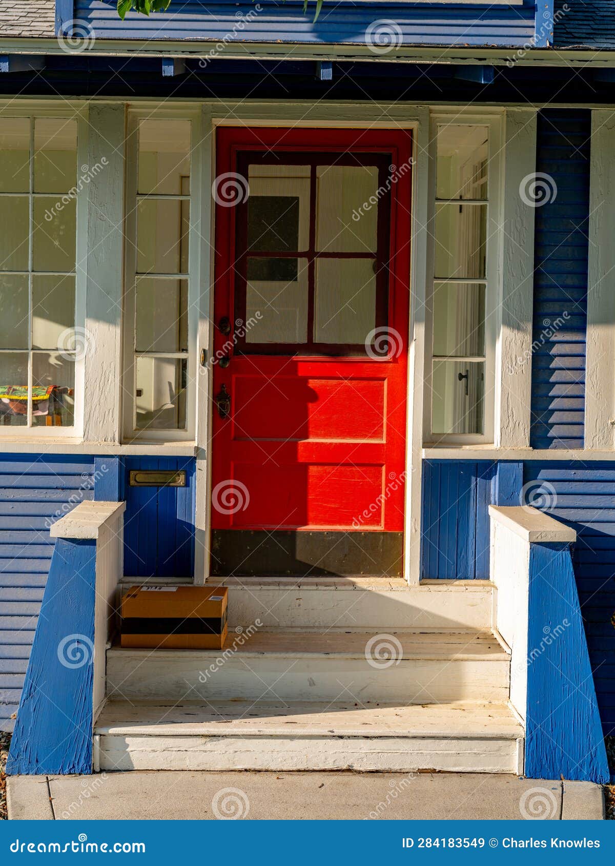 Front Steps of a House with a Package Delivery Stock Image - Image of ...