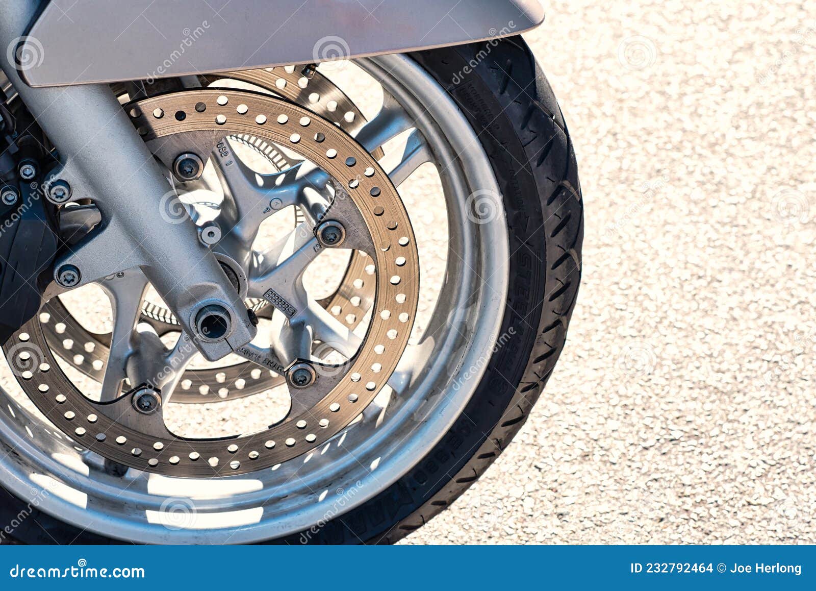 The Front Tire and Disc Brakes on a Motorcycle. Stock Photo - Image of ...