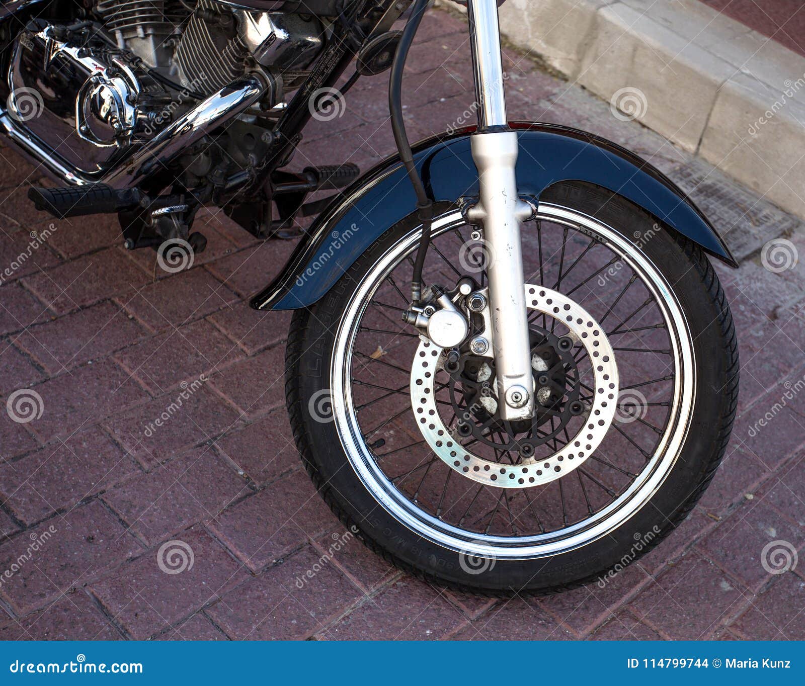 The Front Tire of a Parked Custom Motorcycle Stock Photo - Image of ...