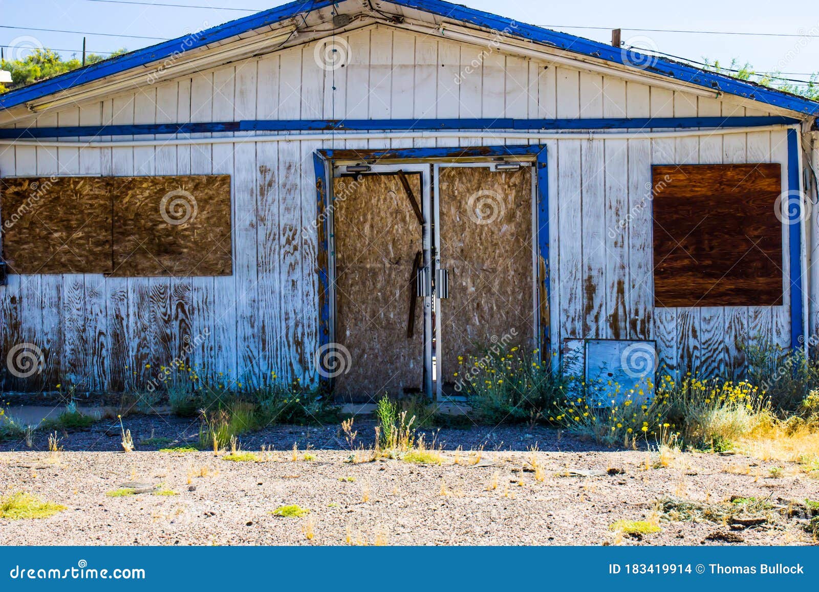 Front of Uninhabitable Building with Boarded Up Doorway Stock Photo ...