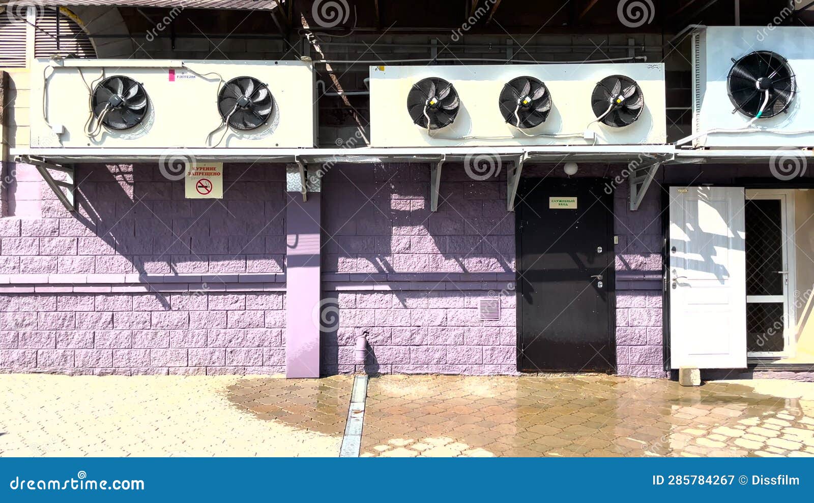 Front View of Air Conditioning System Installed on Wall Above the Door ...