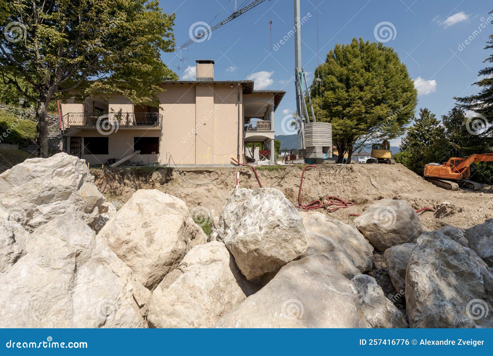 Front View of an Ancient Villa Under Renovation. in the Foreground ...