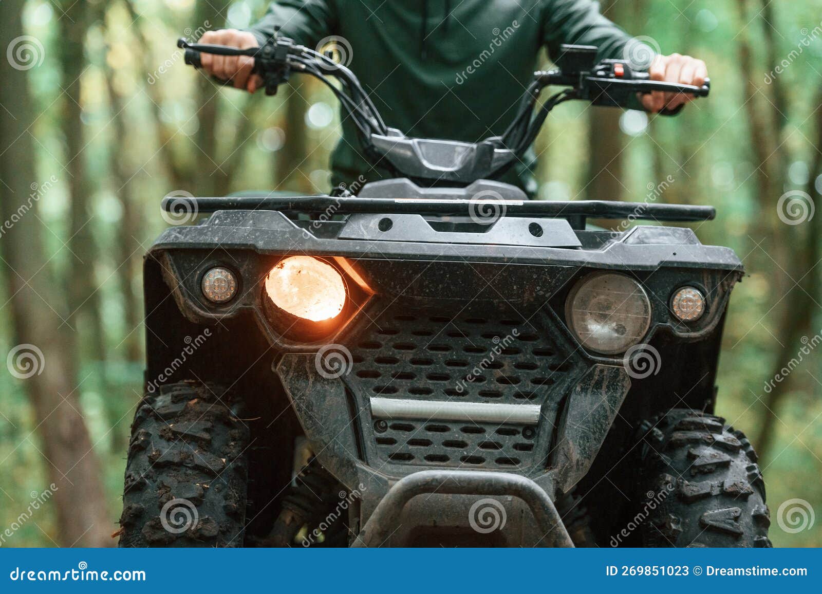 Front View. ATV Driver is in the Forest, Having a Ride at Daytime Stock ...