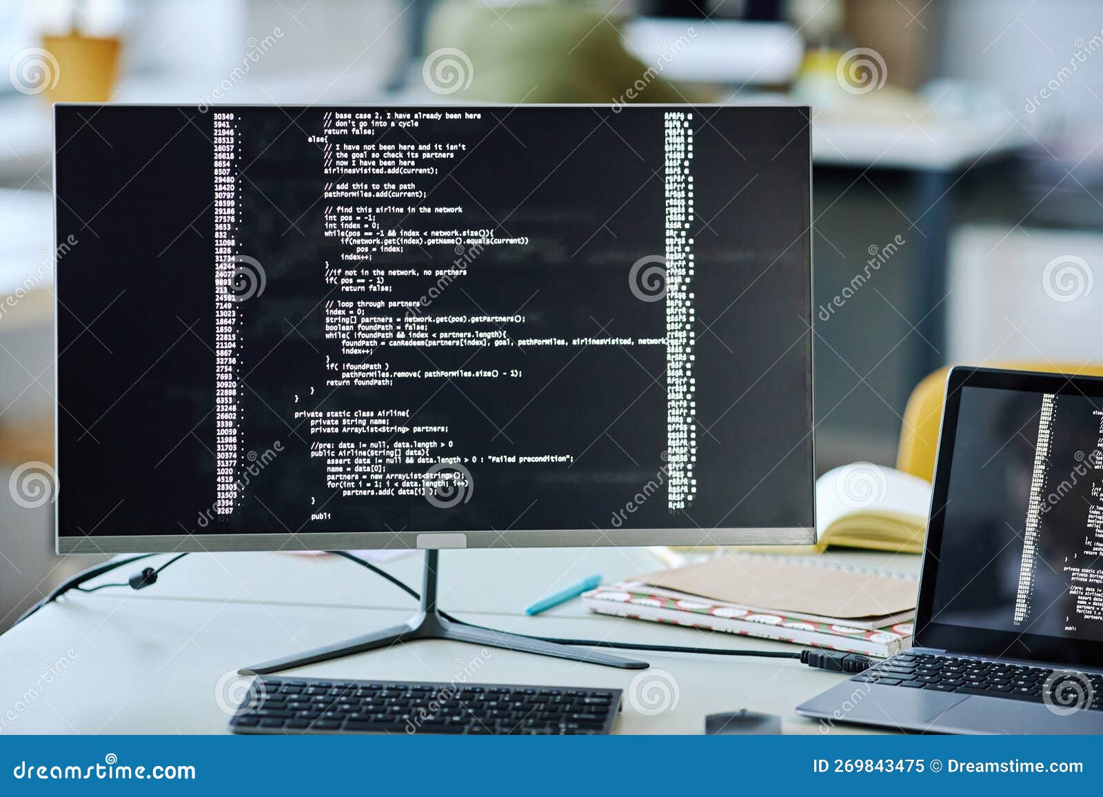 Background Image of Computer Screen with Code Lines on Desk in Office ...