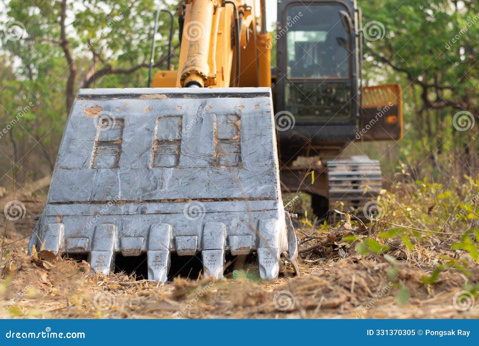 Front View of a Backhoe Parked To Take a Break from Work Stock Image ...