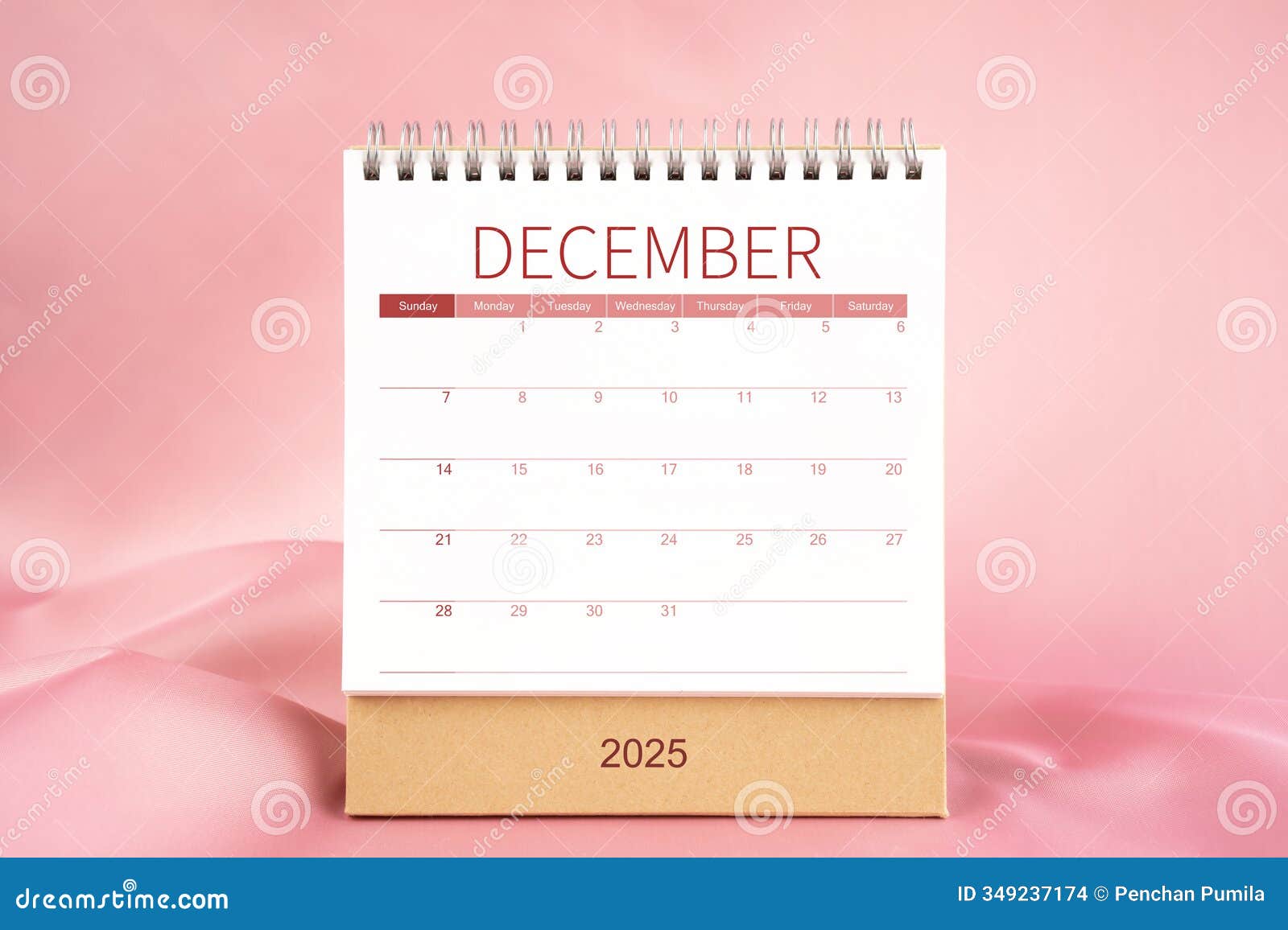Front View of Blank December 2025 Desk Calendar on Pink Textile Stock ...