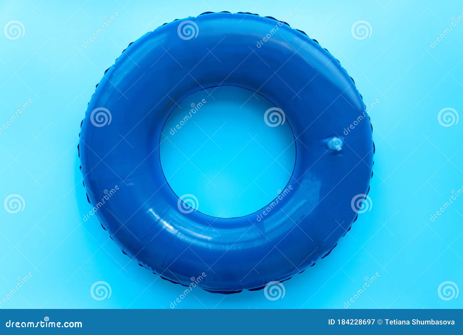 Front View of Blue Rubber Ring for Swimming Pool on Blue Background ...