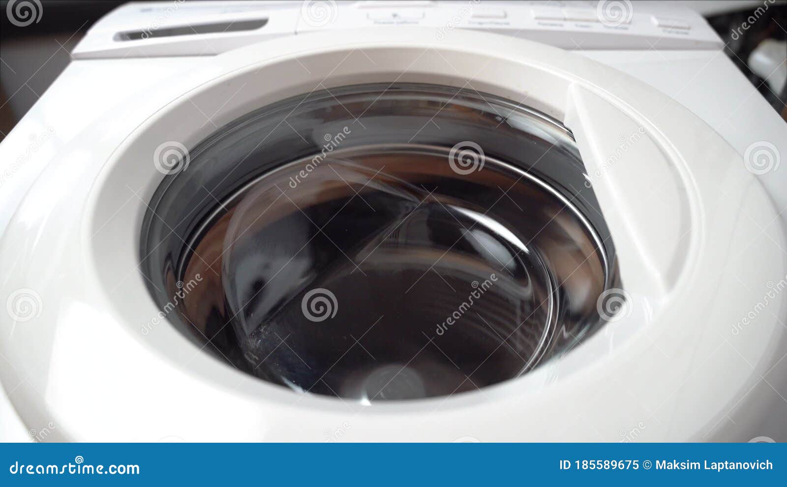 Front View from Bottom of the Glass Door of the Washing Machine, an ...