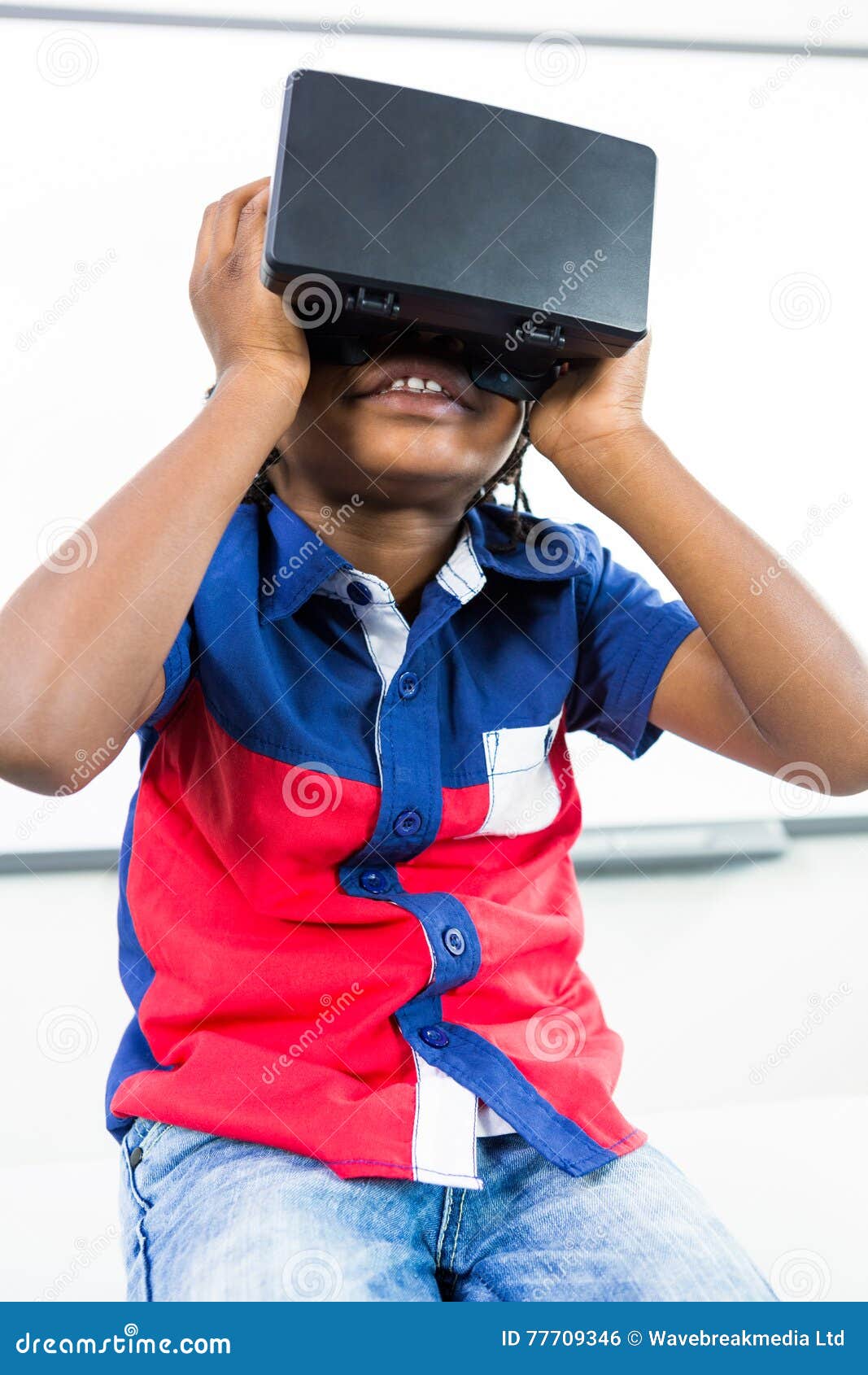 Front View of Boy Using Virtual Reality Headset in Classroom Stock ...