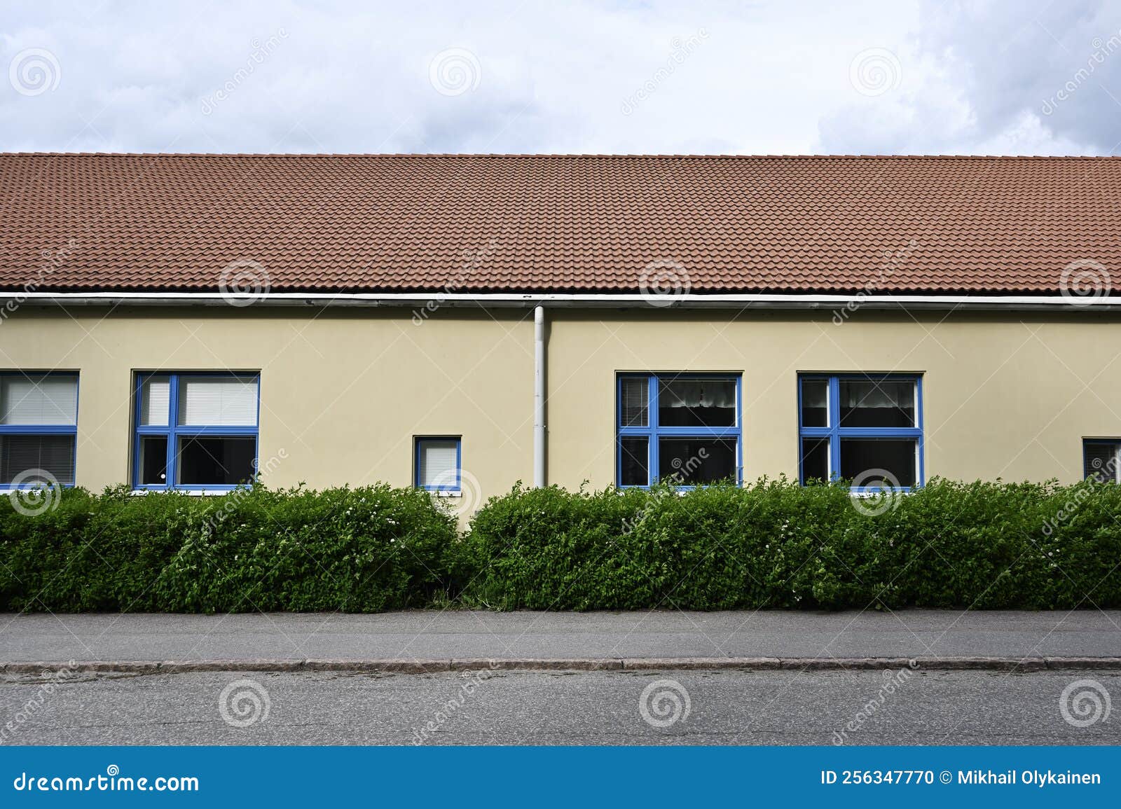 Front View of a Building with a Tiled Roof Stock Photo - Image of ...