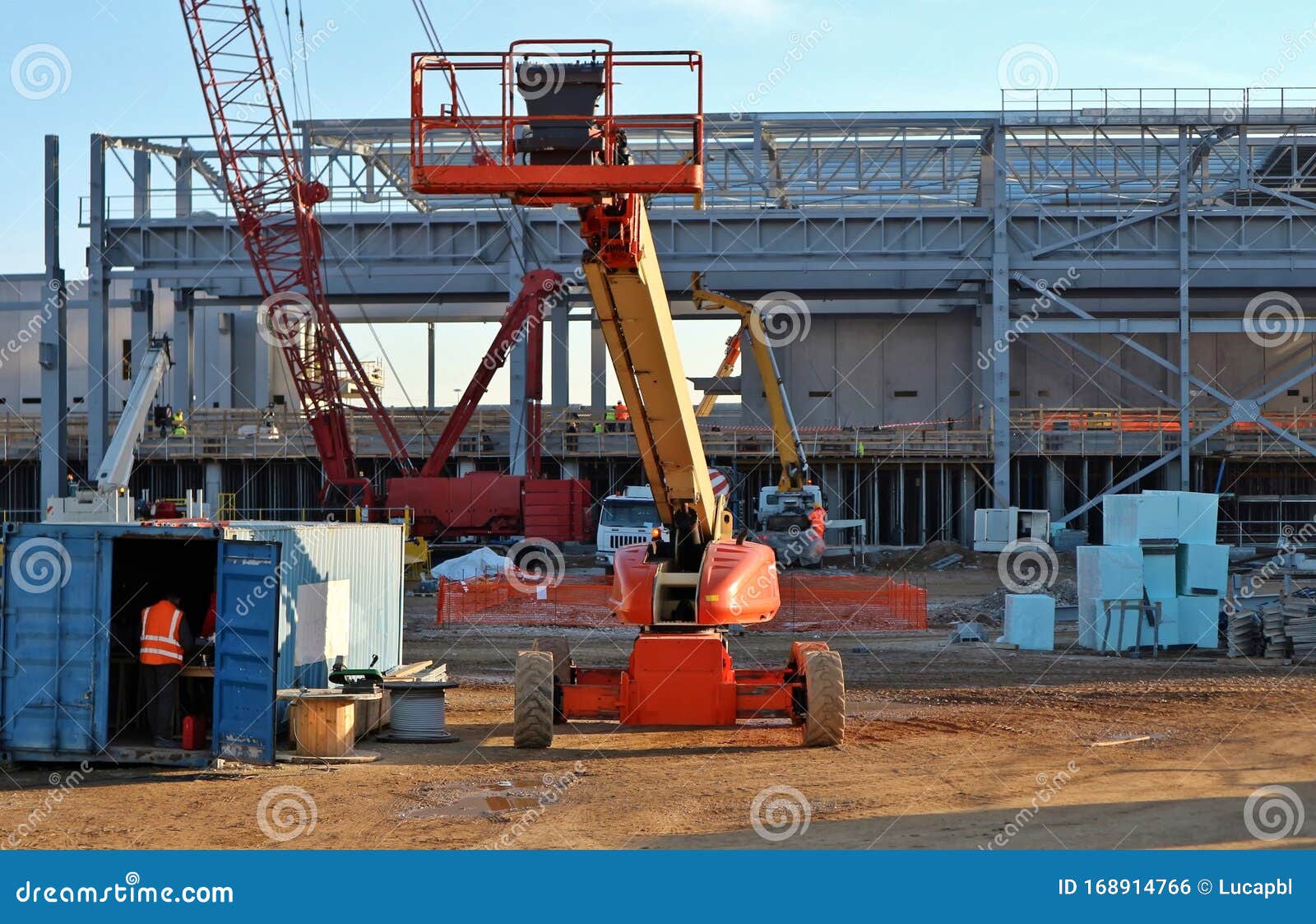 Front View of Cherry Picker. on Background a Building Under ...