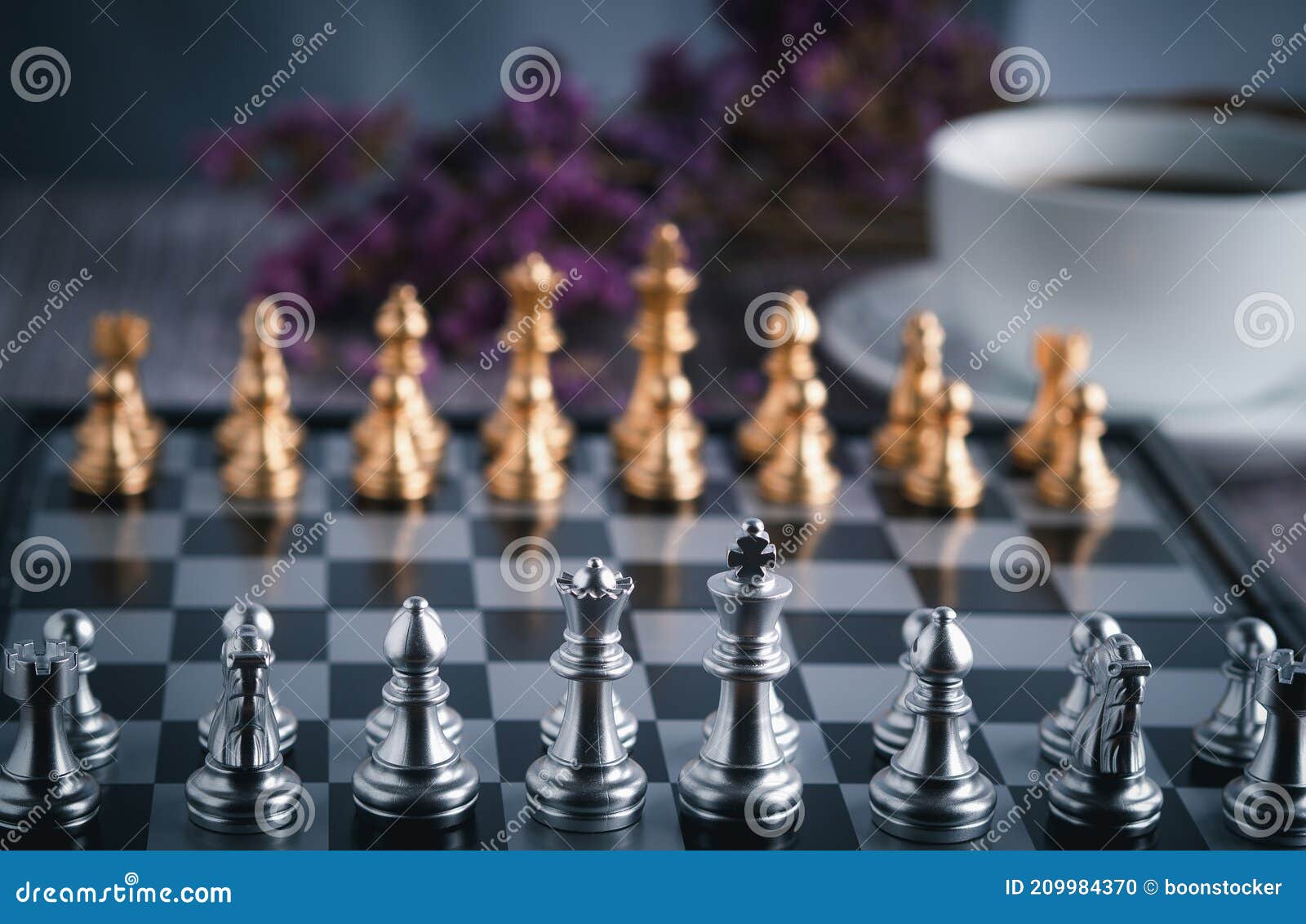 Front View of a Chess Game on a Chessboard with a White Coffee Cup Blur ...